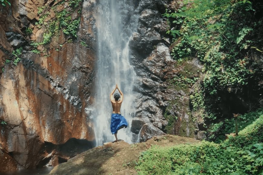 Jagasatru Waterfall with the Statue of Lord Brahma - Bali Padma Bhuwana
